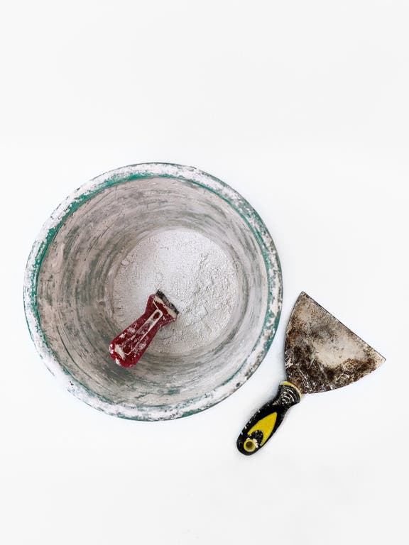 Spatula is Placed Inside an Old Plastic Bucket. Process of Manual ...