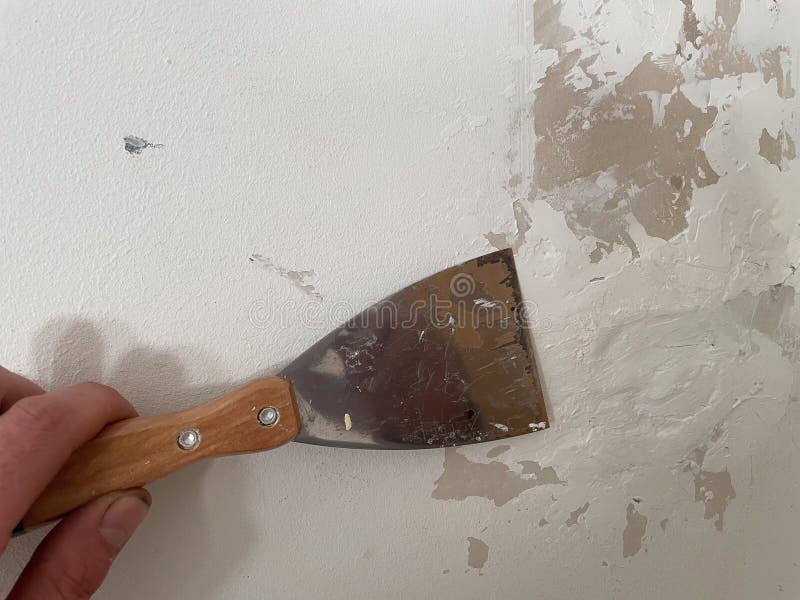 Spatula on a Wall while Fixing in a Room Stock Image - Image of ...