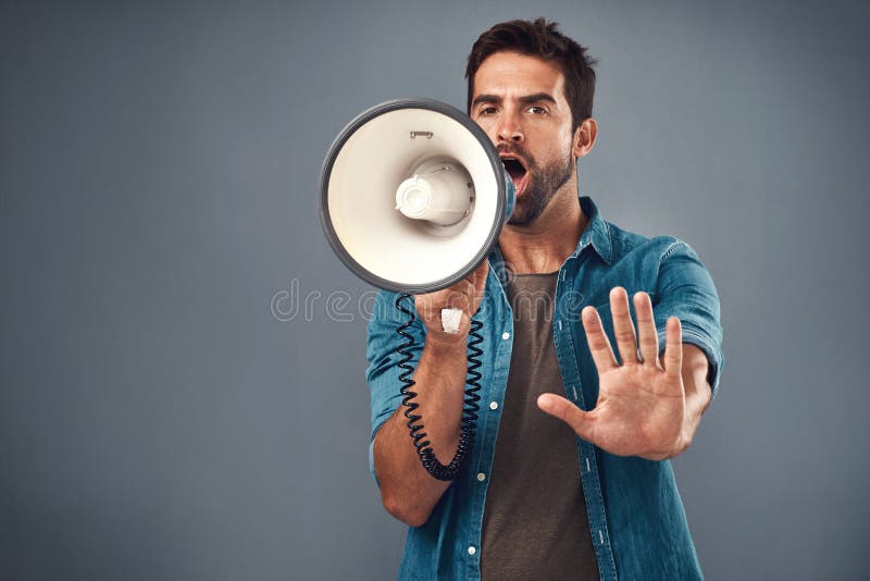 Speak Up in the Name of Justice. Studio Shot of a Handsome Young Man ...