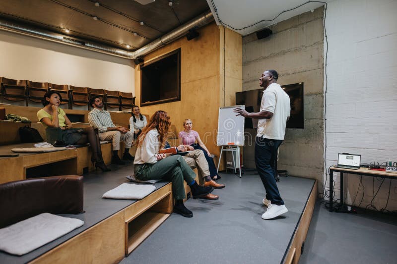 Speaker Engaging Diverse Audience in Modern Meeting Room Setting at ...