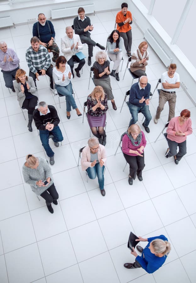 Speaker and a Group of Senior People Starting a Seminar Stock Image ...