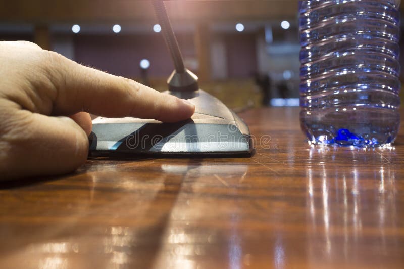 Speaker Hand Pressing on-off Button of a Table Conference Microphone ...