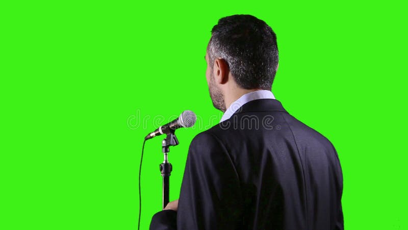 Speaker with Microphone on Green Screen Stock Footage - Video of ...