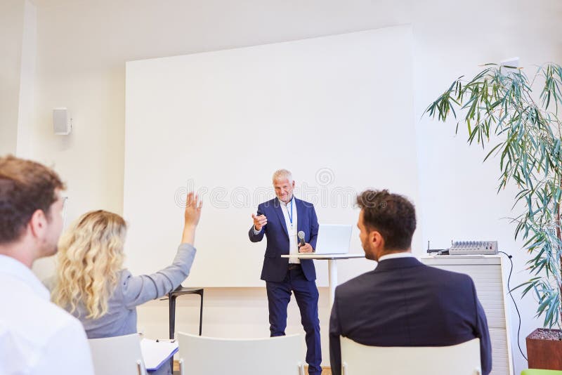 Speaker with Microphone during a Lecture in Front of an Audience Stock ...