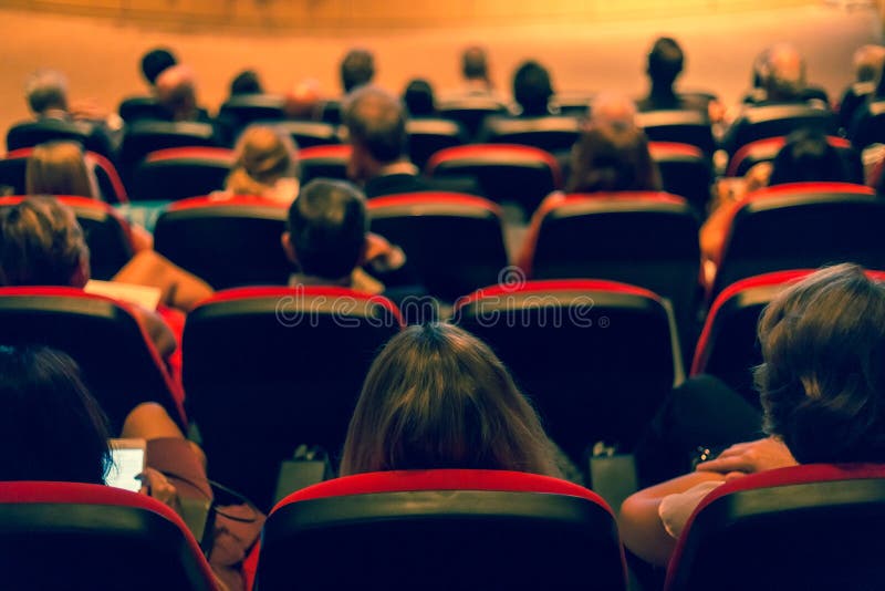 The Speaker Talking about Business Conference. Audience at the ...