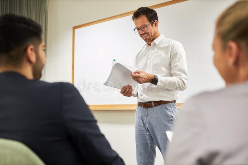 Speaker or Trainer in a Seminar with a Questionnaire Stock Photo ...