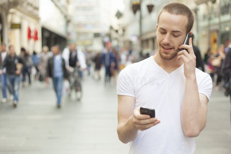 Men Speaking on Mobile Phone and Holding Secund Stock Image - Image of ...