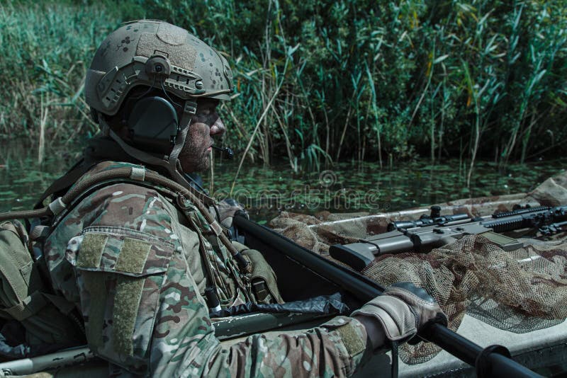 Spec Ops in the Military Kayak Stock Image - Image of commando, warfare ...