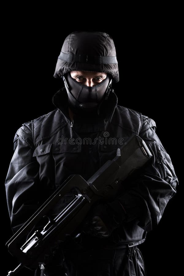 Soldier in Black Uniform with Rifle Stock Image - Image of gunner, male ...