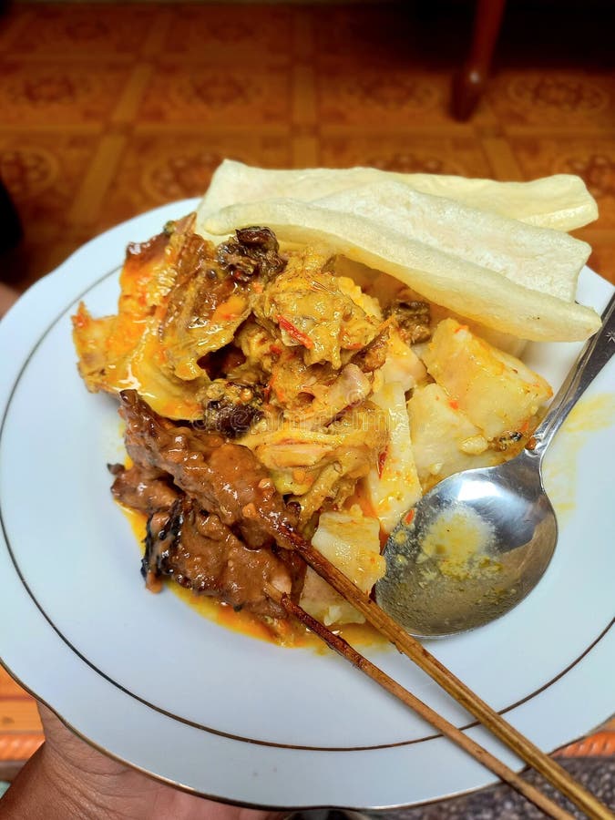 Special Chicken Lodo, Lontong, and Chicken Satay Stock Photo - Image of ...