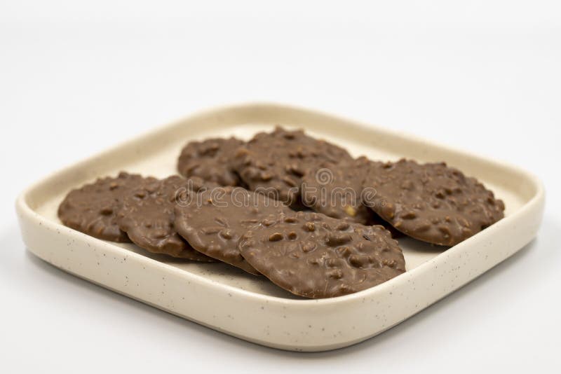 Special Chocolate with Hazelnut Particles. Chocolate with Hazelnuts on ...