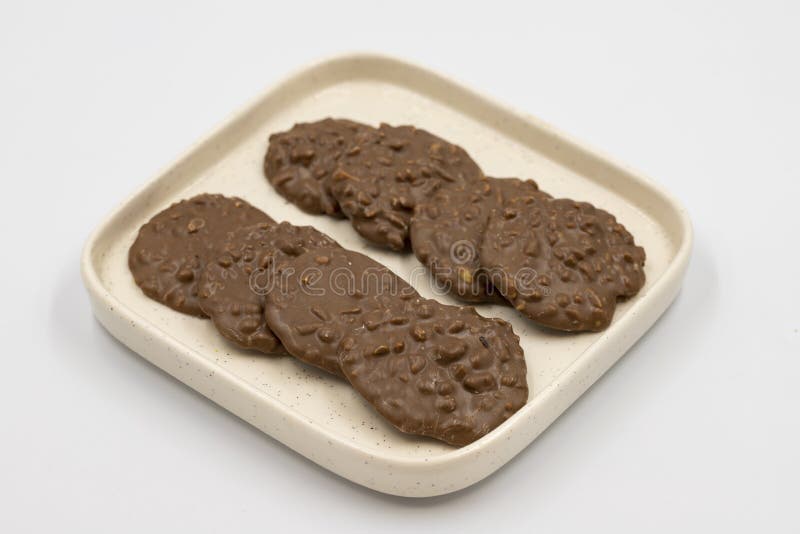 Special Chocolate with Hazelnut Particles. Chocolate with Hazelnuts on ...