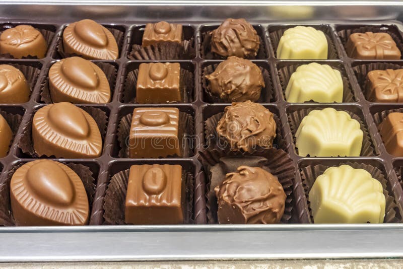 Special Chocolates with Different Figures in Gift Box Stock Photo ...
