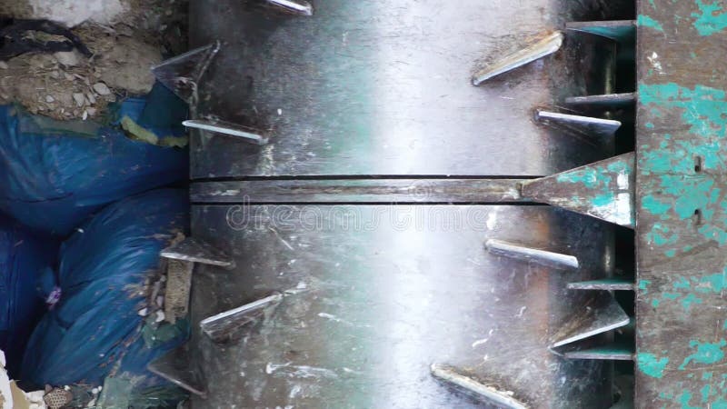 Special Equipment is Pressing Construction Waste in a Container for ...