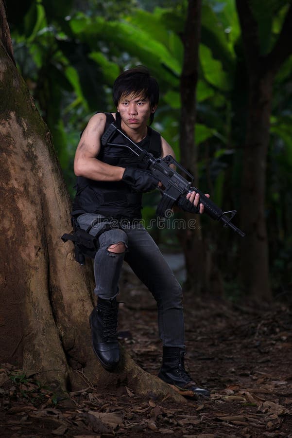 Jungle soldier over white stock image. Image of assassin - 60558657