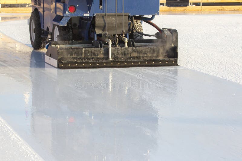 Special Machine for Cleaning Ice on an Ice Rink at Work. Transport ...