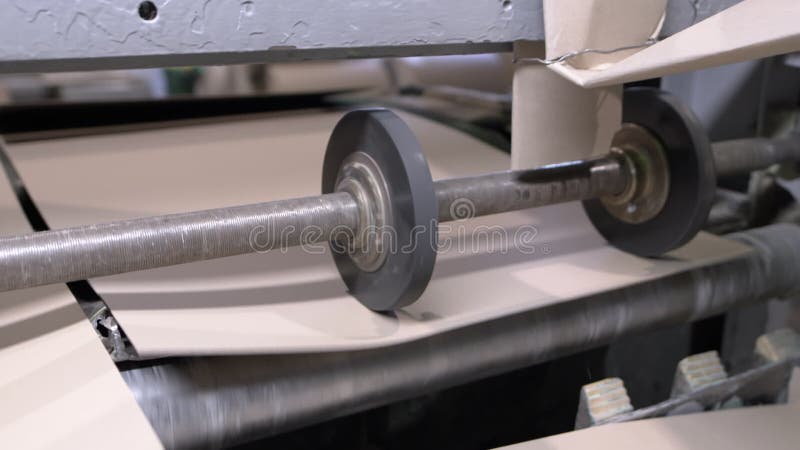 Special Mechanisms Create Smooth Cardboard Surface in Shop Stock ...