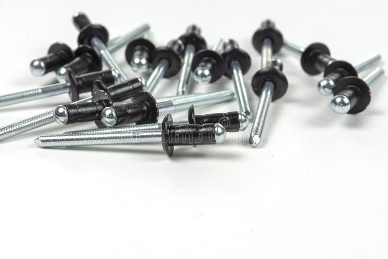 Special Metal Rivets in Bulk on a White Background Stock Photo - Image ...