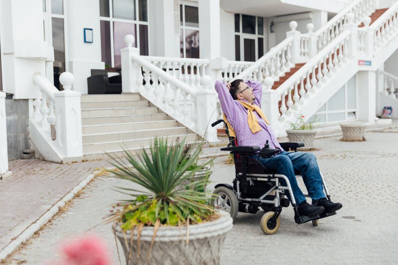 A Special Person with Disabilities at the Stairs of an Office Building ...