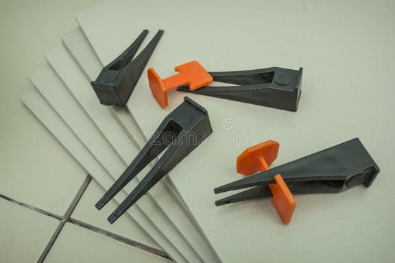 Special Plastic Clamps for Horizontal Alignment of Ceramic Tiles during ...