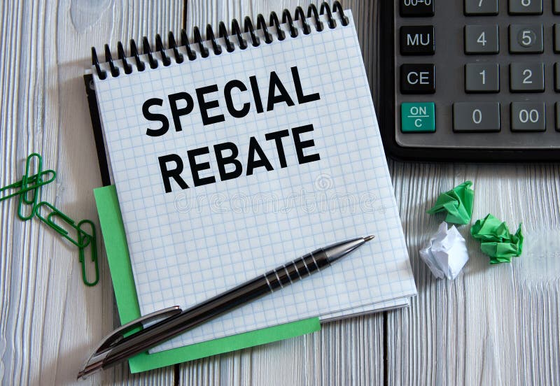 SPECIAL REBATE - Words on a White Notepad on the Background of a ...