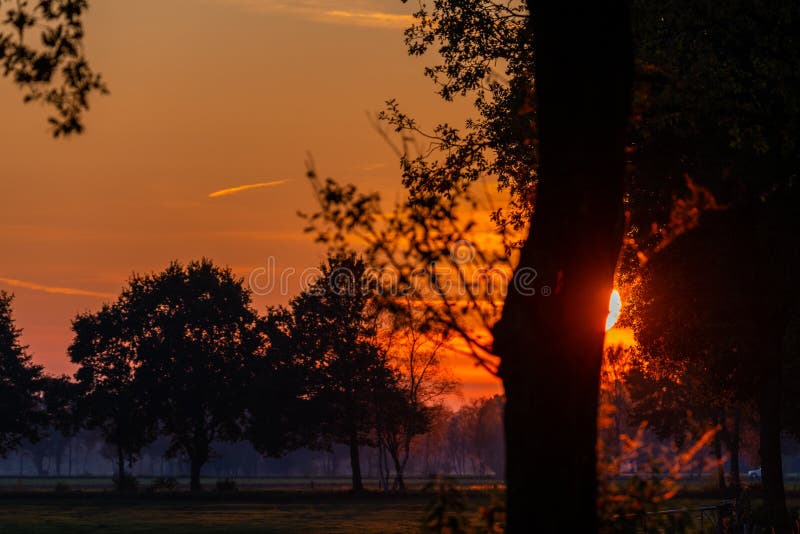 A Special Sunset with Intense Colors in the Autumn Evening Stock Photo ...