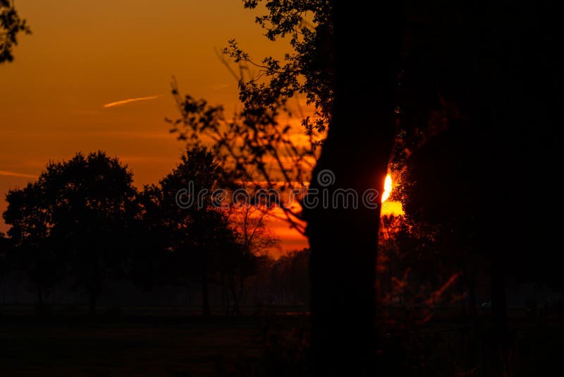 A Special Sunset with Intense Colors in the Autumn Evening Stock Photo ...