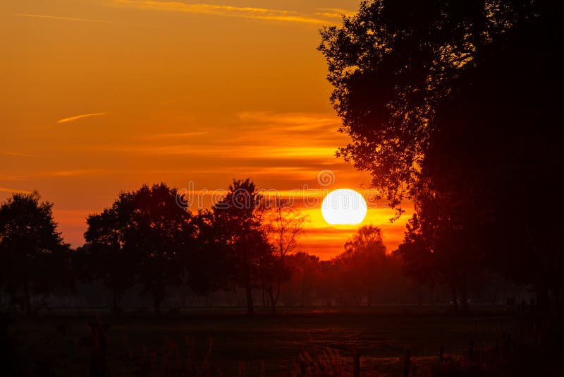 A Special Sunset with Intense Colors in the Autumn Evening Stock Photo ...
