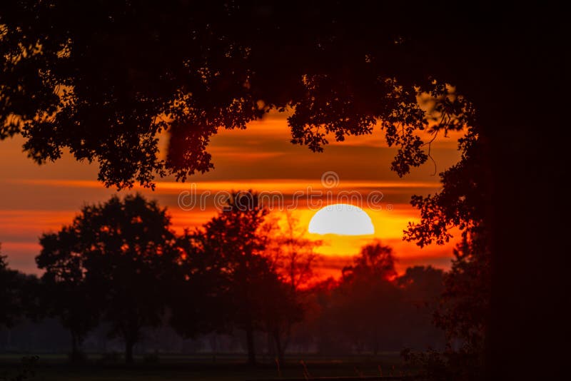 A Special Sunset with Intense Colors in the Autumn Evening Stock Photo ...