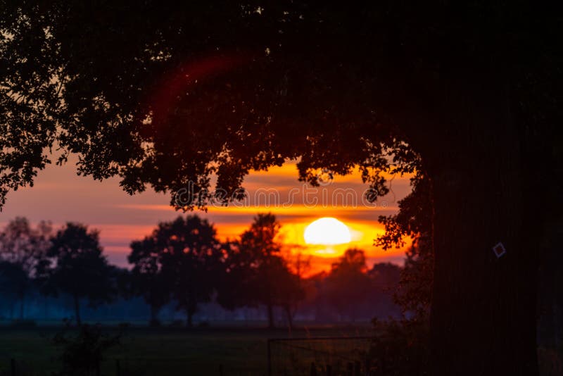 A Special Sunset with Intense Colors in the Autumn Evening Stock Image ...