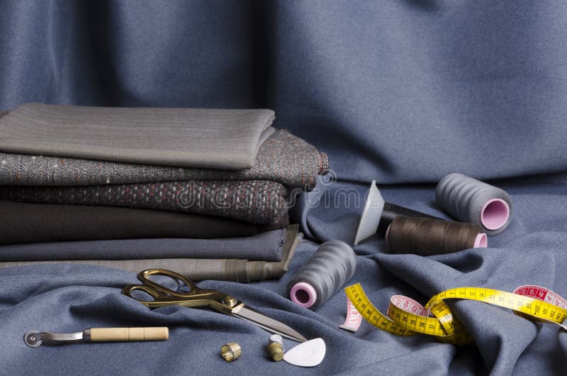 Special Tailor`s Tools for Creating Woolen Suits. Fabrics, Threads ...