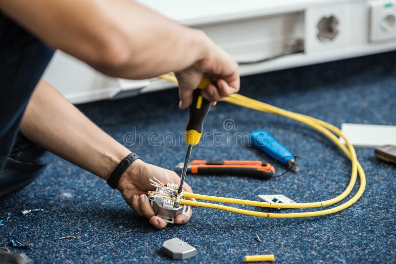 Specialist Connect a Network Cable with RJ45 Sockets, Process of Laying ...
