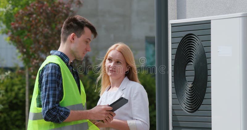 The Specialist Explains To the Customer the Principle of Operation of ...