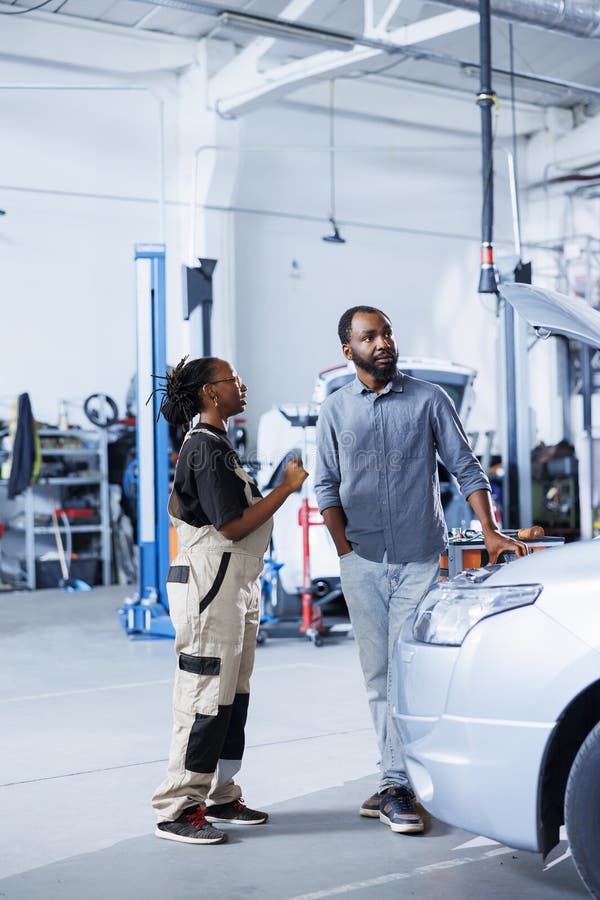 Specialist Shows Man Car Defects with AR Stock Image - Image of ... Specialist Shows Man Car Defects with AR Stock Image - Image of ...