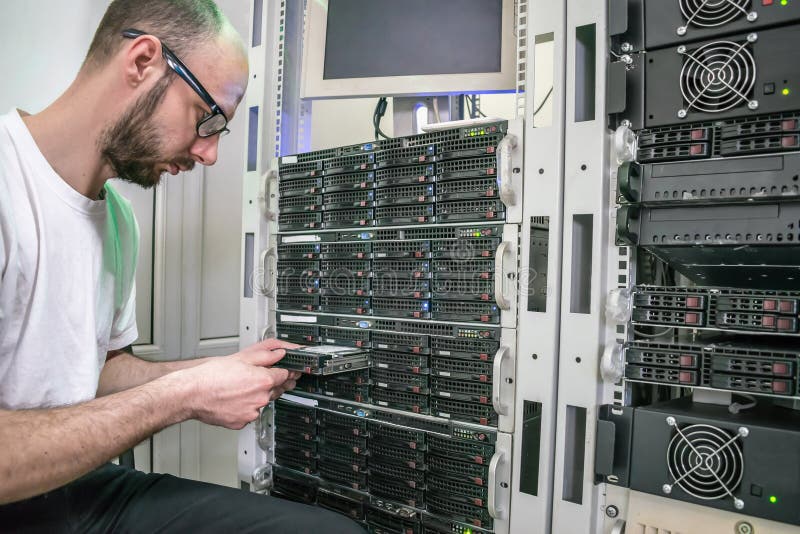 The Specialist Updates the Data Center Computer Equipment. Technician ...