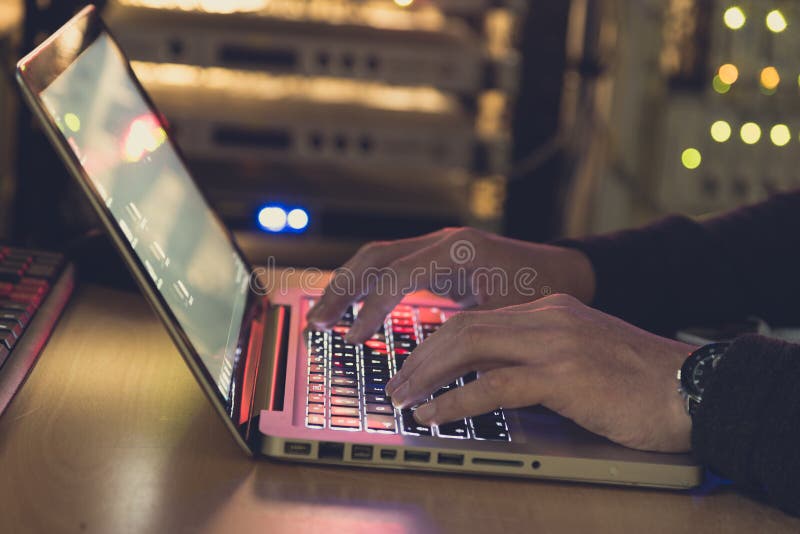 It Specialist Works in a Server Room on a Computer Stock Image - Image ...