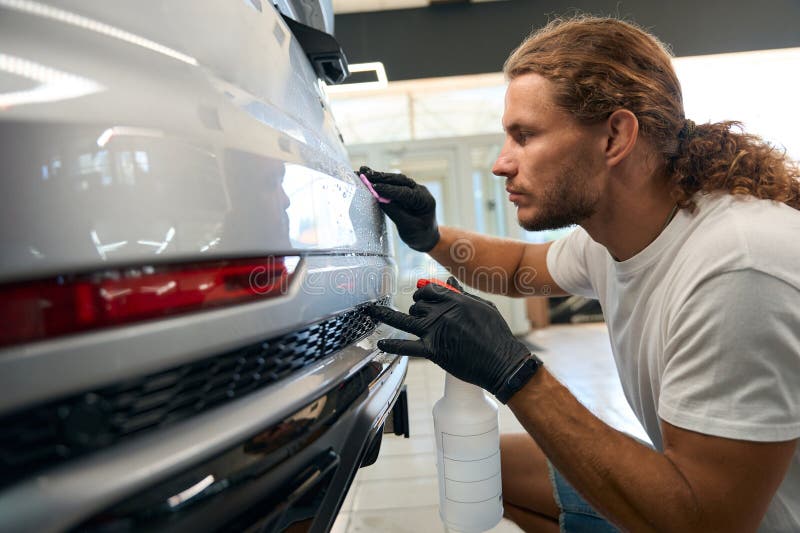 Specialist Works with Special Clay in Car Detailing Stock Image - Image ...