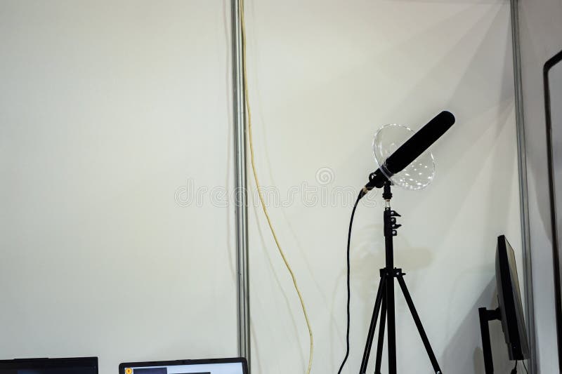 Specialized Directional Microphone with a Clear Shield on a Tripod for ...