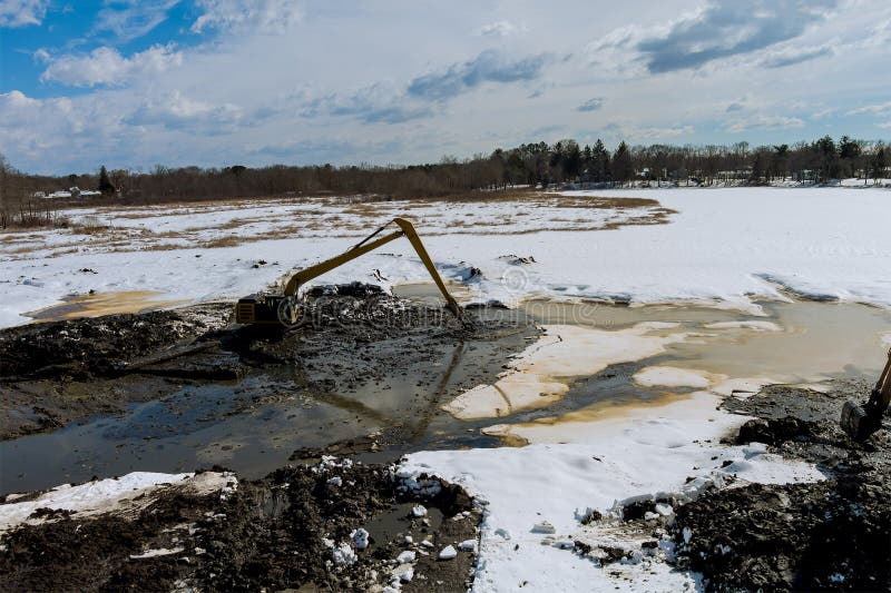 Specialized Excavator Cleans Lake Sediments of Lake Bottom Stock Image ...