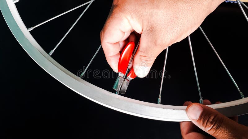 Specific Tool, Repairing a Bicycle Wheel Using an Appropriate Tool ...
