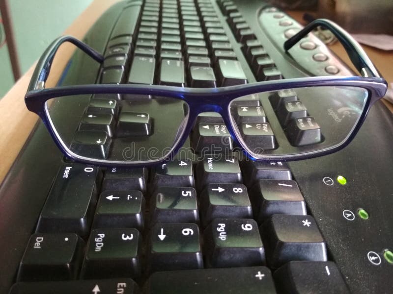 Specs on keyboard editorial stock image. Image of programmer - 120698534