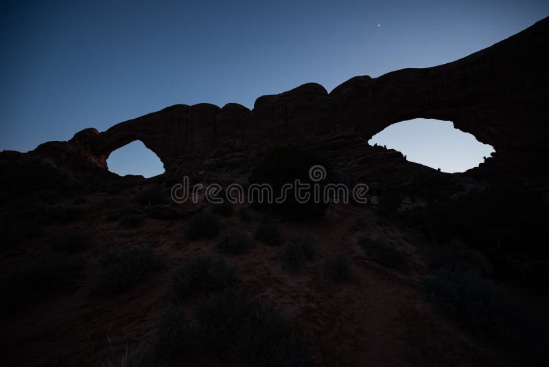 The Spectacles at Dusk with People Sitting in the Arches Stock Image ...
