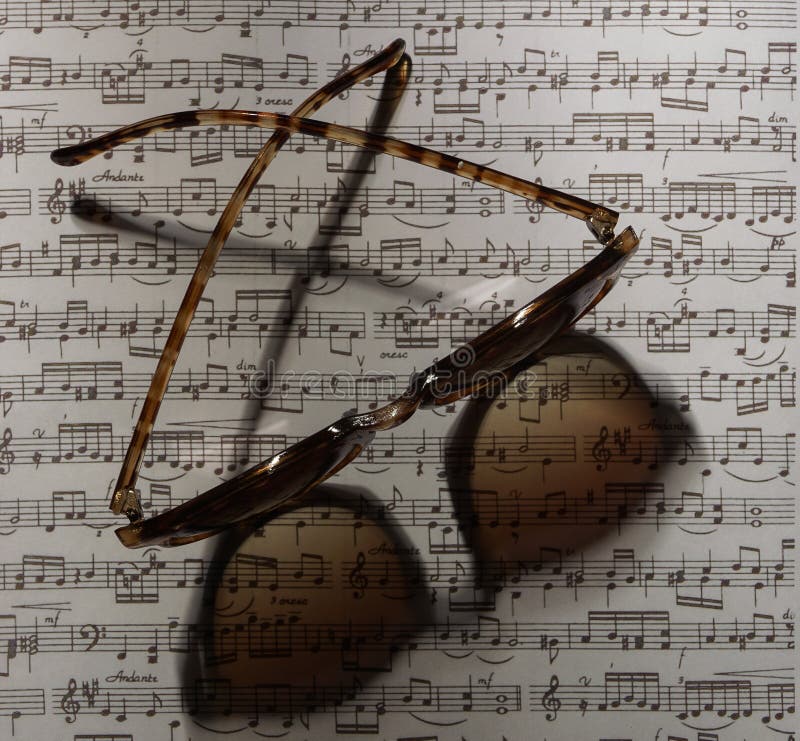 Spectacles Eye Protectors on Randomly Placed Music Notes from Computer ...