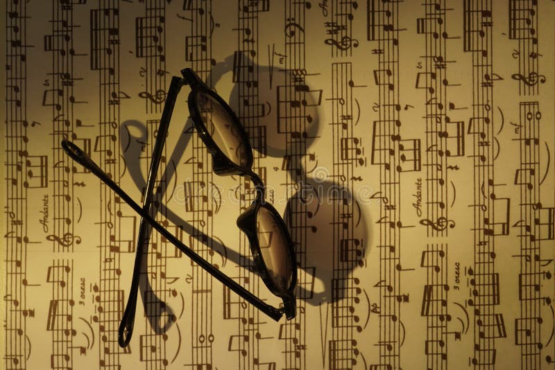 Spectacles Eye Protectors on Randomly Placed Music Notes from Computer ...