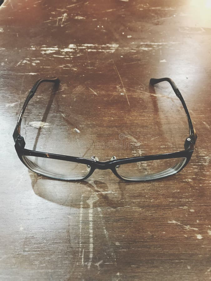 Spectacles on table stock image. Image of frames, sides - 92080381
