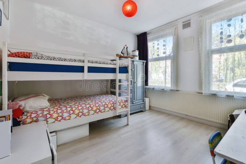 Spectacular Bedroom with a Bed and Two Windows Stock Image - Image of ...