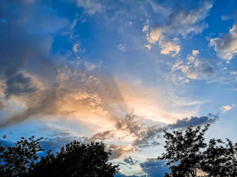 Spectacular Blue Sky with Mistic Clouds and Rays of Lights Stock Image ...
