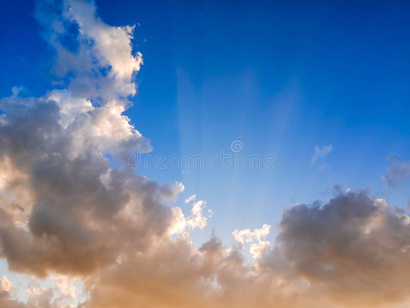 Spectacular Blue Sky with Mistic Clouds and Rays of Lights Stock Image ...