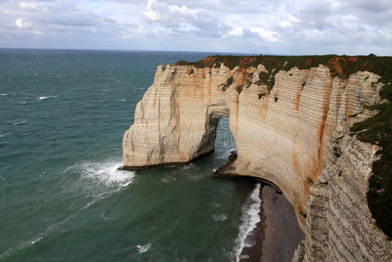 Spectacular Cliffs and a Natural Arch Stock Photo - Image of beach ...