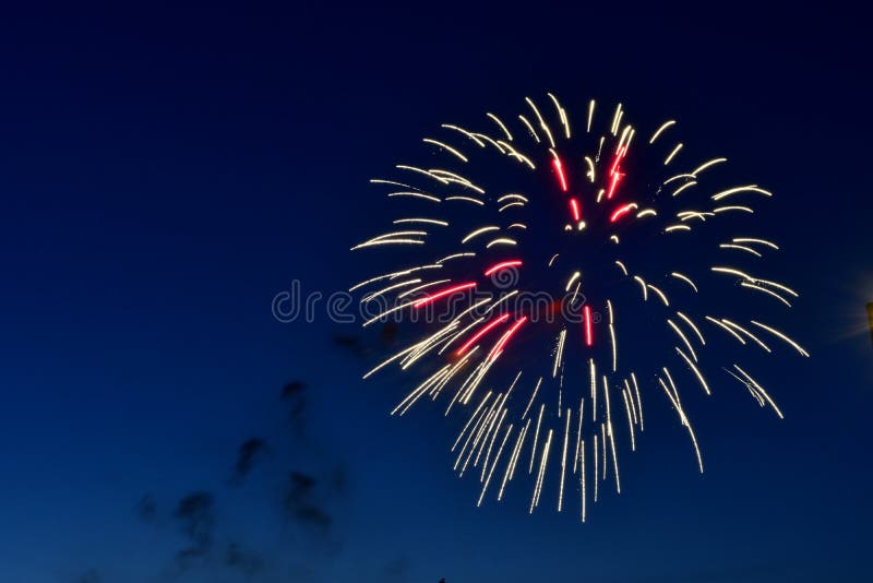 Colorful Fireworks Explode into the Night Sky. Stock Photo - Image of ...